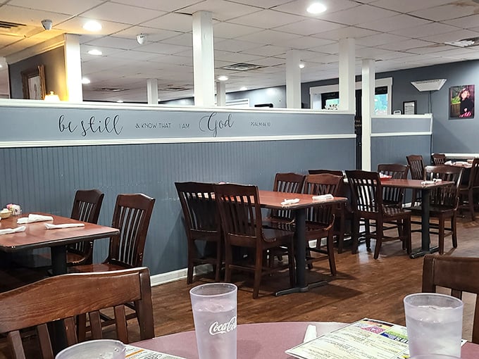 Blue wainscoting and wooden chairs create that perfect "come as you are" atmosphere where comfort trumps pretension and breakfast reigns supreme.