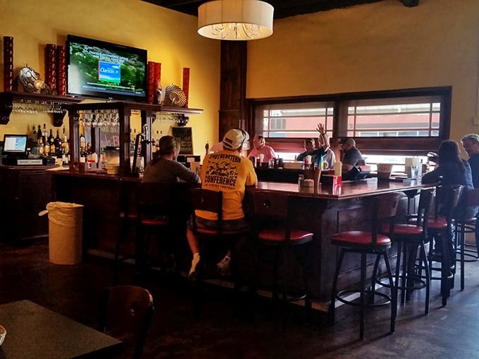 The bar at Dupuy's isn't just a place to wait for your table &ndash; it's where strangers become friends and cocktails become conversation starters. 