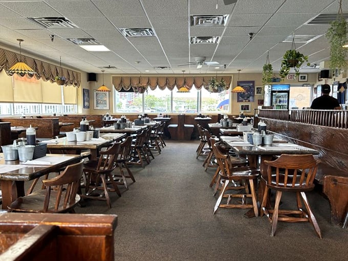 Classic diner vibes with wooden tables and hanging plants&mdash;where breakfast dreams are served with a side of nostalgia.