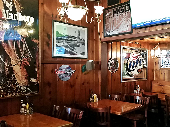 Classic wood-paneled walls adorned with sports memorabilia and vintage beer signs &ndash; the dining room equivalent of a warm Michigan hug.