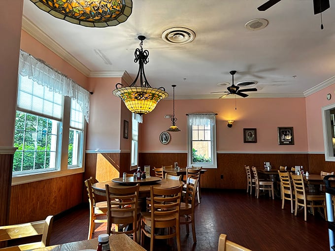 Tiffany-style lamps cast a golden glow over wooden tables where memories are made and belt notches are loosened.