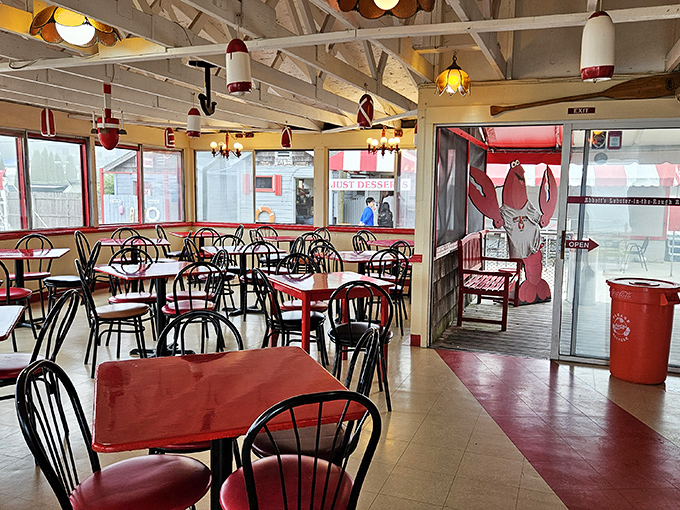 Nautical simplicity defines the interior, where buoy-inspired lights dangle from white-washed beams. No fancy tablecloths needed when the food speaks this loudly.