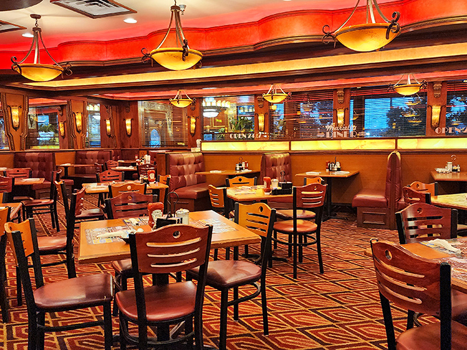 Warm wood tones, comfortable booths, and ambient lighting create that rare atmosphere where conversations flow as smoothly as the coffee refills.