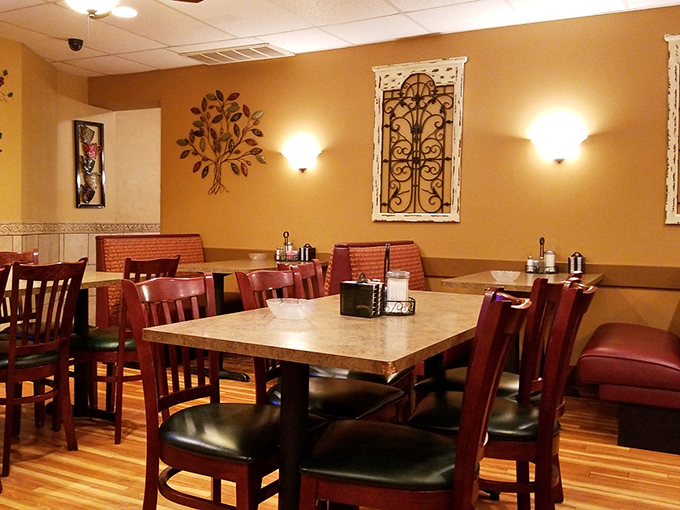 Warm lighting, comfortable booths, and the promise of homemade goodness create the perfect breakfast sanctuary.