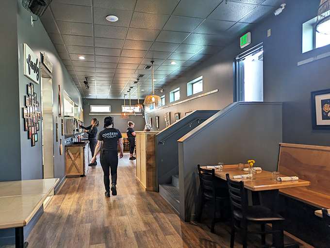 Clean lines, warm wood, and blue-gray walls create a maritime-inspired haven. The kind of place where memories are made between bites.