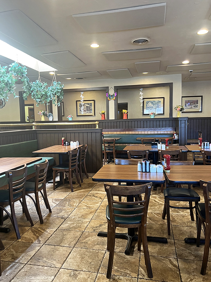 Inside, dark wood paneling and green upholstery create that perfect "come as you are" atmosphere where comfort trumps pretension every time.