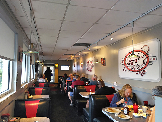 Inside Jack's, the classic red and black booths aren't trying to be retro&mdash;they've simply earned their vintage status through decades of faithful service.