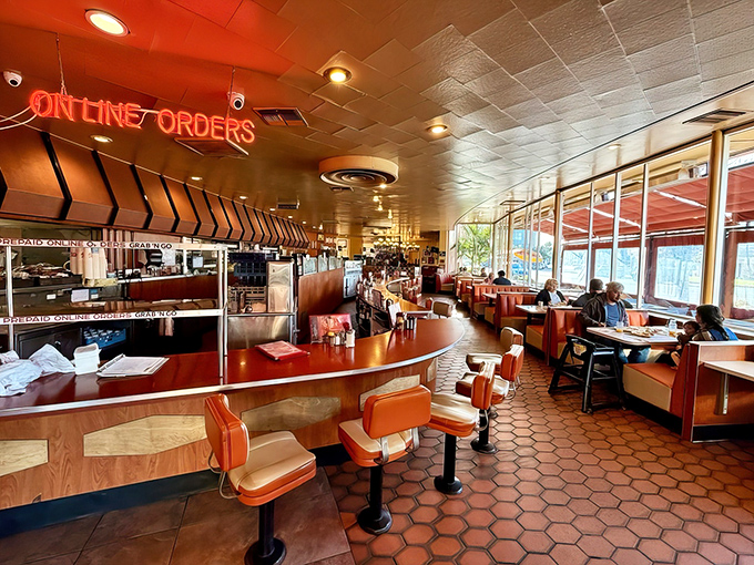 Step inside and time travel hasn't been this delicious since 1955&mdash;hexagonal tiles, curved counters, and the promise of comfort food perfection.