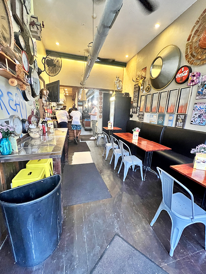 Inside, every inch tells a story. Vintage clocks, memorabilia, and cozy seating create an atmosphere that feels like a well-loved family kitchen.