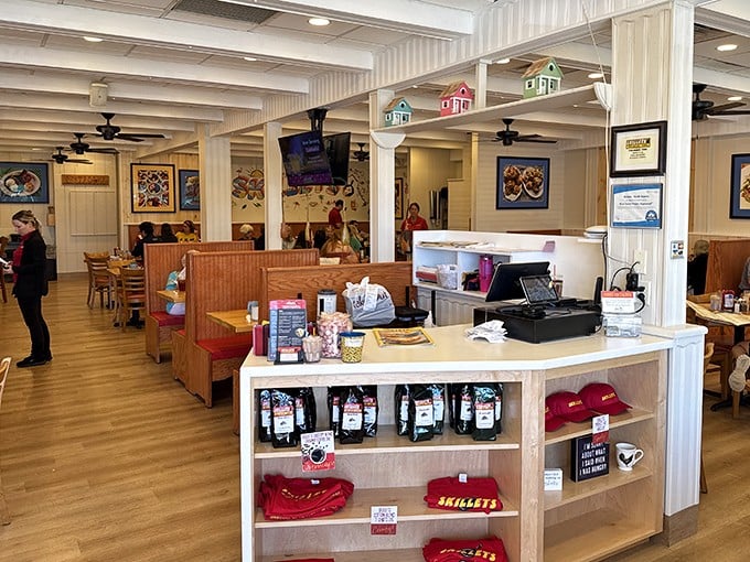 Step inside and you're greeted by warm woods, cozy booths, and those charming little house decorations that say "welcome home, now let's eat!"