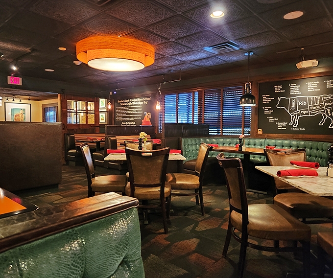 Step inside and time slows down. Emerald booths, warm lighting, and those ornate ceiling tiles transport you to a more civilized era of dining.