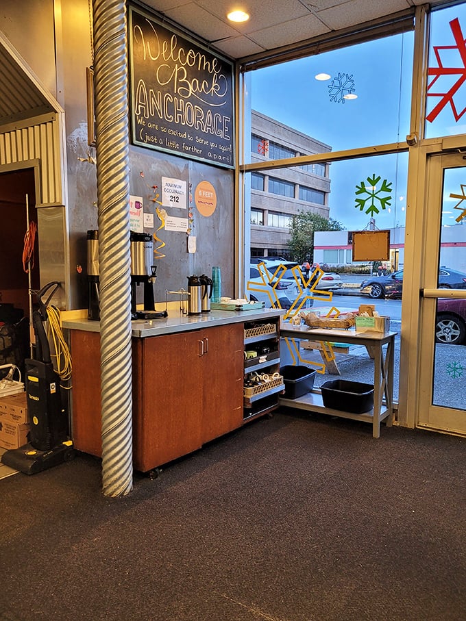 "Welcome Back Anchorage" declares the chalkboard, embodying the cafe's community spirit. Even their social distancing message manages to sound like a warm hug.