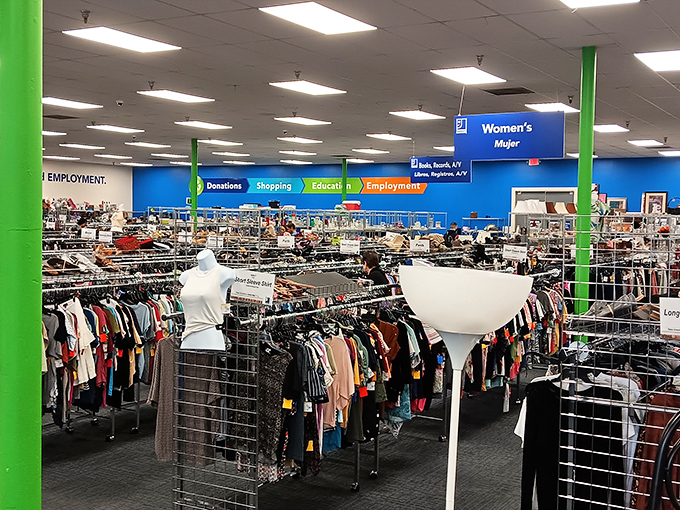 Organized chaos at its finest. The women's section alone could outfit a small nation, with color-coded racks stretching toward retail infinity.