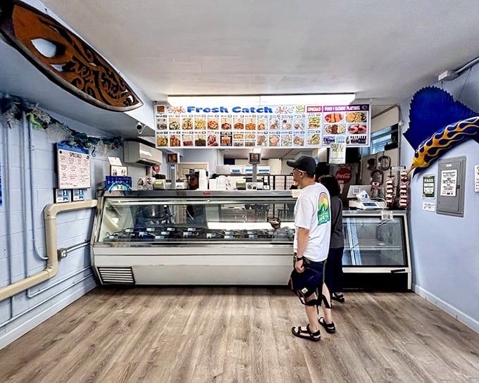 Inside Fresh Catch, the no-frills interior lets you know immediately: this place is serious about seafood, not d&eacute;cor. That display case is where the magic begins.