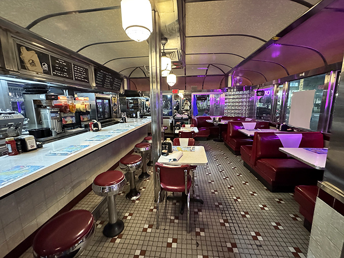Classic red vinyl booths, chrome fixtures, and that unmistakable diner counter—stepping inside feels like walking onto the set of your favorite 1950s sitcom.