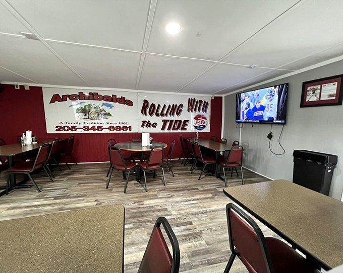 Inside, crimson chairs and "Rolling With The Tide" signs remind you that in Alabama, football and barbecue are practically religious experiences.