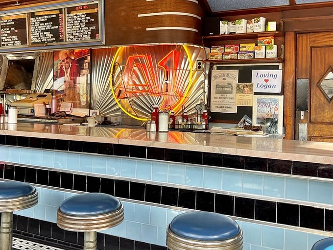 Classic blue counter stools invite you to belly up to the stainless steel counter, where Maine's version of diner therapy happens one cup of coffee at a time.