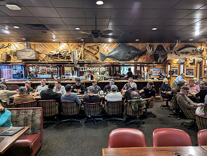 Where fishing tales grow taller with each round. The mounted trophies silently judge the exaggerations while the bar buzzes with the authentic soundtrack of Alaska.