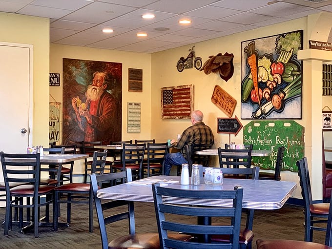 Americana adorns every wall, creating that perfect "been here forever" vibe. That mountain man painting has definitely seen some serious pancake consumption.