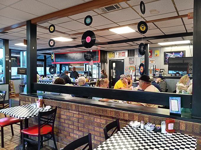 Step inside and the vinyl records suspended from the ceiling aren't just decoration &ndash; they're a time machine to when jukeboxes ruled and calories weren't counted.