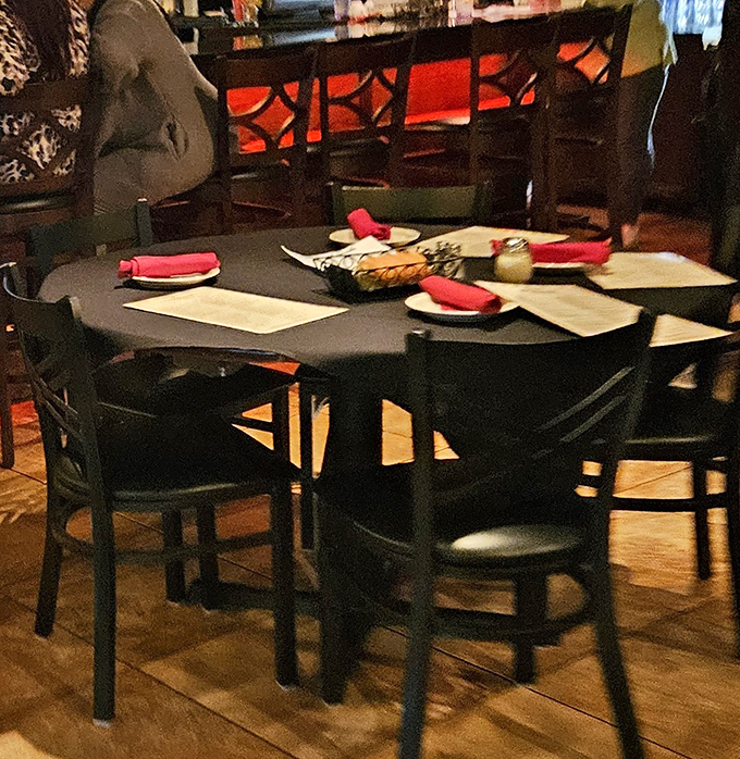 Inside, the warm lighting and intimate table settings create that perfect "you've just discovered something special" atmosphere that makes memorable dining experiences.