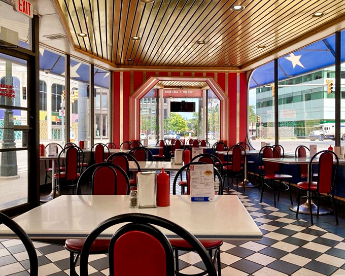 Step inside and time stands still&mdash;red vinyl booths, checkerboard floors, and wooden ceilings create the perfect backdrop for Detroit's most famous food feud.