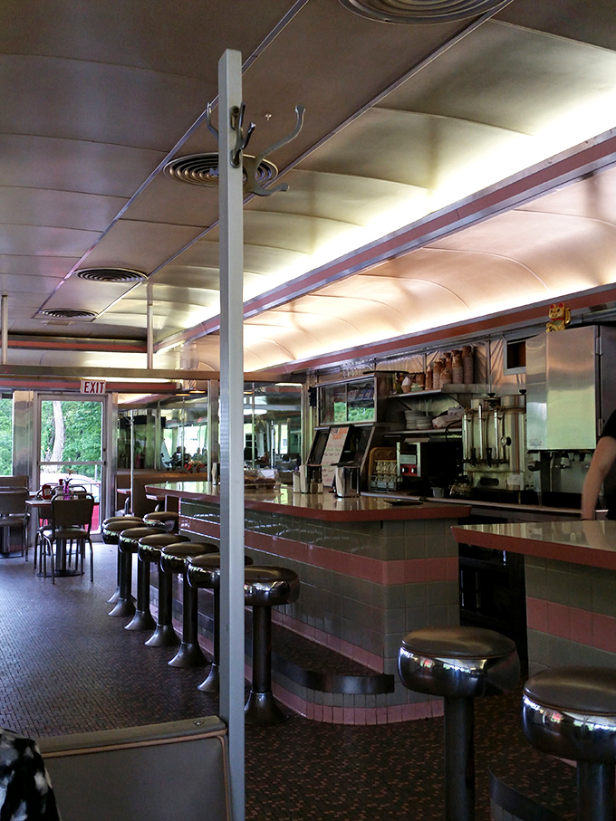 Inside, chrome stools line the counter where culinary magic happens. This isn't just a diner&mdash;it's a front-row seat to breakfast theater.