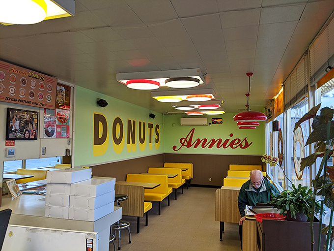 Yellow booths and retro lighting fixtures create a time capsule where calories don't count and coffee refills flow as freely as conversation.