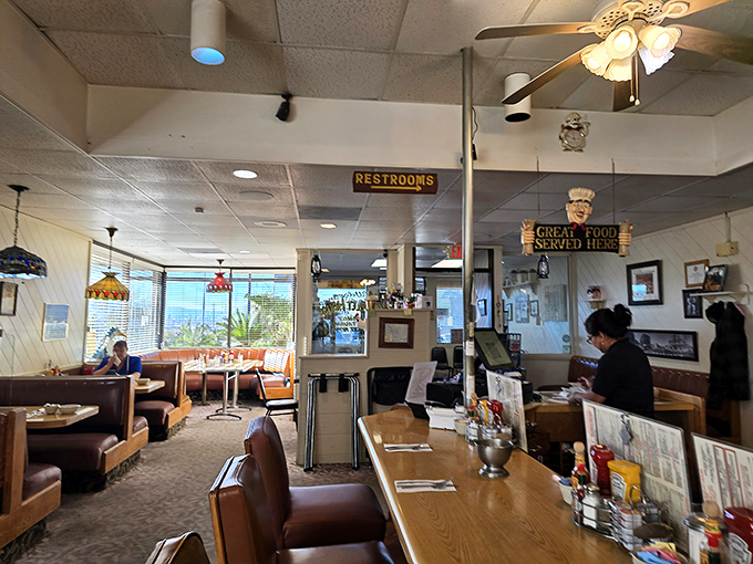 Classic diner ambiance with a side of nostalgia&mdash;where ceiling fans spin lazily above conversations that matter only until the food arrives.