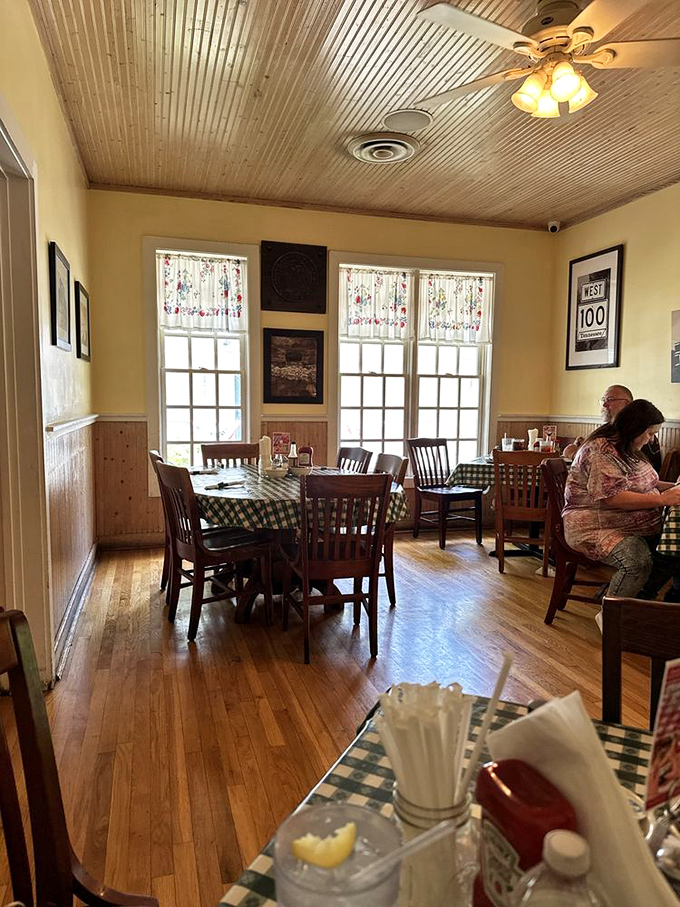 Wooden chairs, checkered tablecloths, and that tin ceiling &ndash; dining rooms don't get more authentically Nashville than this cozy corner. 