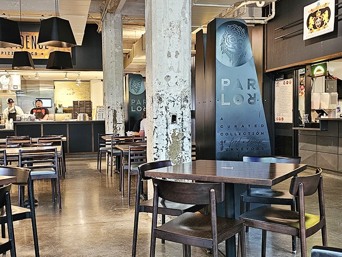 That moment when exposed brick, weathered concrete, and modern design collide to create the perfect urban hangout spot.