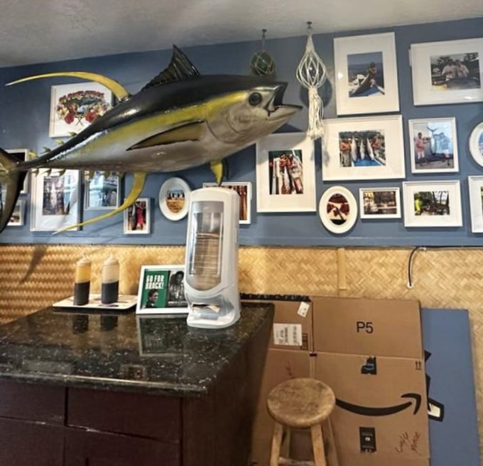 Orange metal chairs pop against leather booths, creating that perfect "industrial chic meets comfort food" vibe Bootleggers is known for.