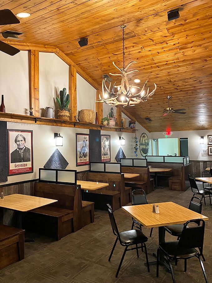 Warm wood ceilings, antler chandeliers, and cozy booths create the perfect backdrop for serious meat appreciation at Bill's Steak House.