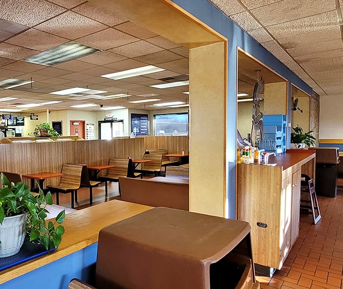 Classic diner booths where conversations flow as freely as the coffee. No fancy designer furniture&mdash;just comfortable spots where food takes center stage.