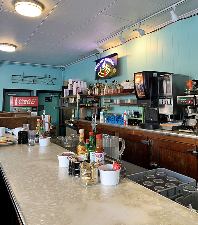 Step inside this mint-green time capsule where authentic diner charm meets serious comfort food craftsmanship.