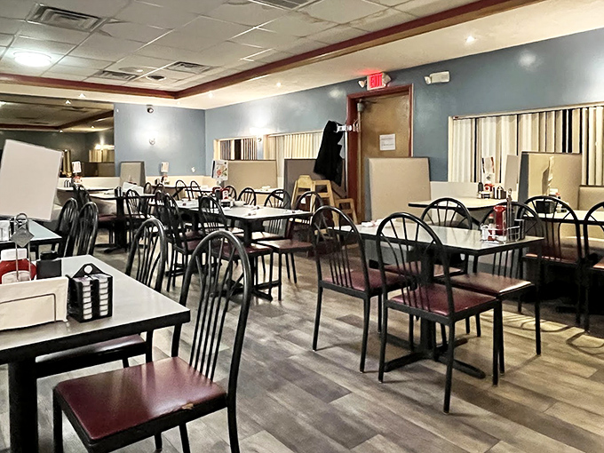 Inside, the no-nonsense blue walls and practical seating promise one thing: this place prioritizes food over frills, exactly as it should.
