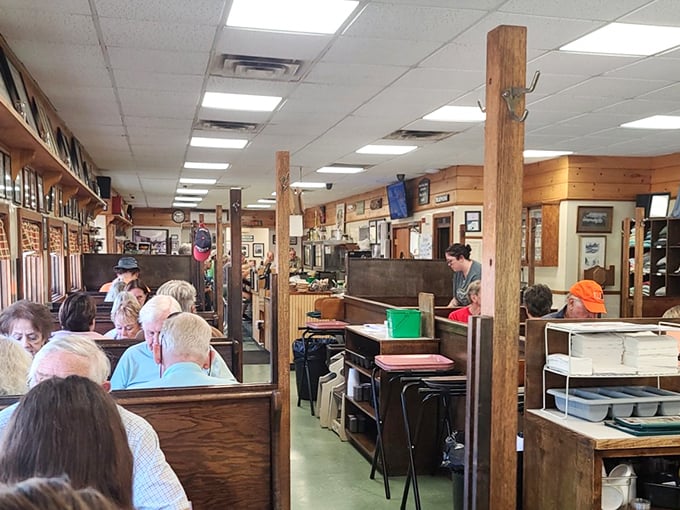 Step inside and discover authentic diner atmosphere where wooden booths and counter seats tell stories of countless satisfied customers.