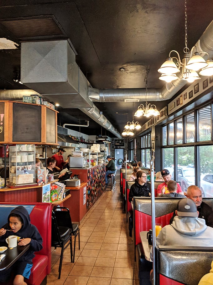 Rustic charm meets Gulf Coast comfort in this cozy dining room where every meal feels like a celebration.