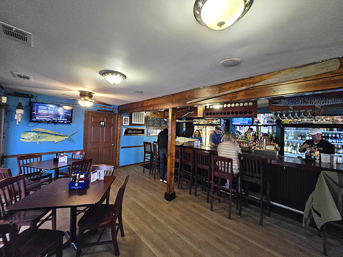 The interior strikes that perfect balance of rustic and refined, with wooden beams and nautical touches creating a space that feels like a well-loved coastal home.