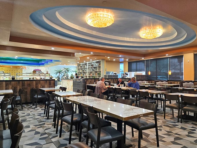 The interior surprises with elegant chandeliers and a sophisticated ceiling design. Who knew an all-you-can-eat buffet could dress so impressively for dinner?