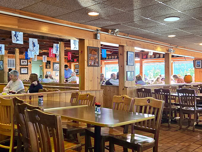 The warm wooden interior speaks volumes about priorities here: comfortable seating, nautical charm, and enough space between tables to keep your crab-cracking enthusiasm from disturbing neighbors.