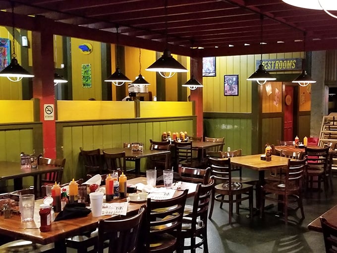 Colorful walls and wooden booths create the perfect backdrop for the serious business of barbecue consumption. No distractions, just focus.