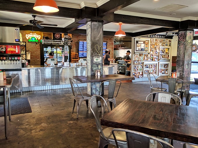 Industrial-chic meets comfort in this unpretentious space where metal, wood, and brick create the perfect backdrop for serious comfort food indulgence.