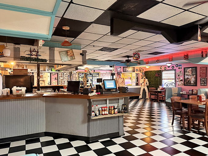 The checkered floor isn't just decoration; it's practically announcing "we take our diner aesthetic seriously" before you've even ordered.
