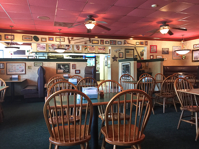 Wooden chairs, wall memorabilia, and that unmistakable pre-pizza anticipation hanging in the air. The dining room where countless "remember whens" have been shared over thin crust.