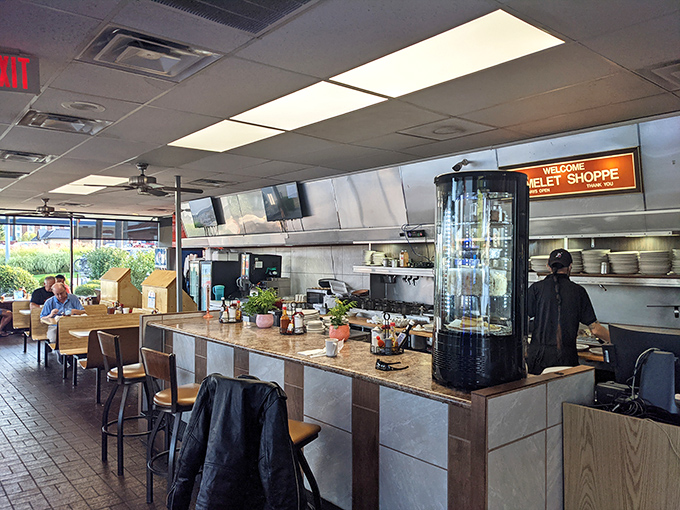 Classic diner counter seating lets you watch the breakfast ballet unfold – skilled short-order cooks transforming simple ingredients into morning masterpieces.