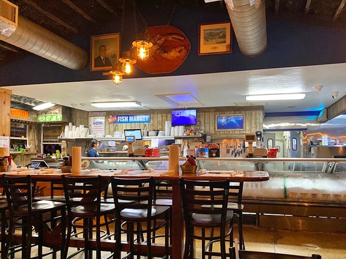 Where fishing tales and fresh catches meet. The wood-paneled interior feels like stepping into a beloved captain's galley that's been serving locals for generations.