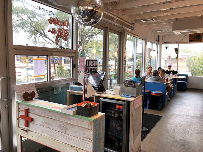 The interior may be cozy, but that disco ball promises a party for your taste buds. Small space, enormous flavors.
