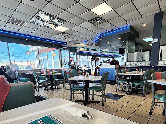 Inside, the teal vinyl booths and checkered floor create that perfect nostalgic atmosphere where conversations flow as freely as the coffee.