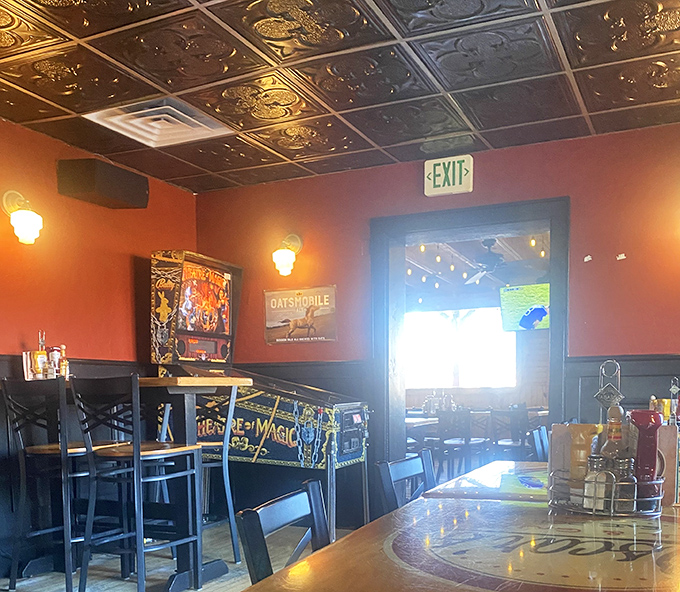Vintage tin ceiling tiles and warm lighting create that perfect "I've found my new favorite spot" ambiance that makes regulars out of first-timers.